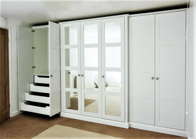 Paneled bespoke Shaker wardrobe with mirror doors – Built in Solutions